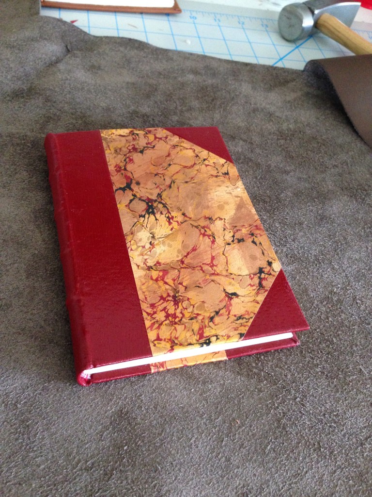 Half Binding in Pigskin and Chena River Marbled Paper - South Winds Bindery